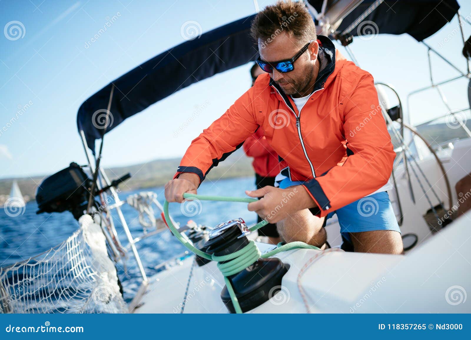 Handsome Strong Man Sailing with His Friends Stock Image - Image of ...