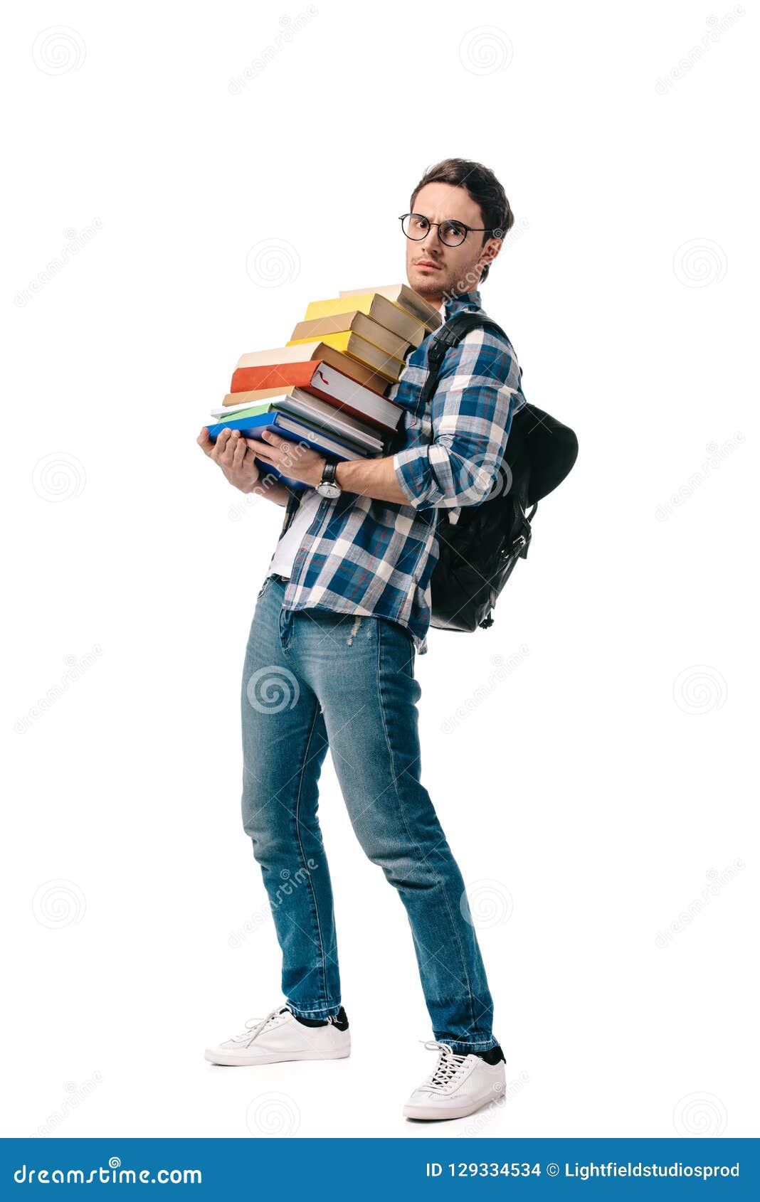 Handsome Student Holding Heavy Stack of Books Stock Photo - Image of ...