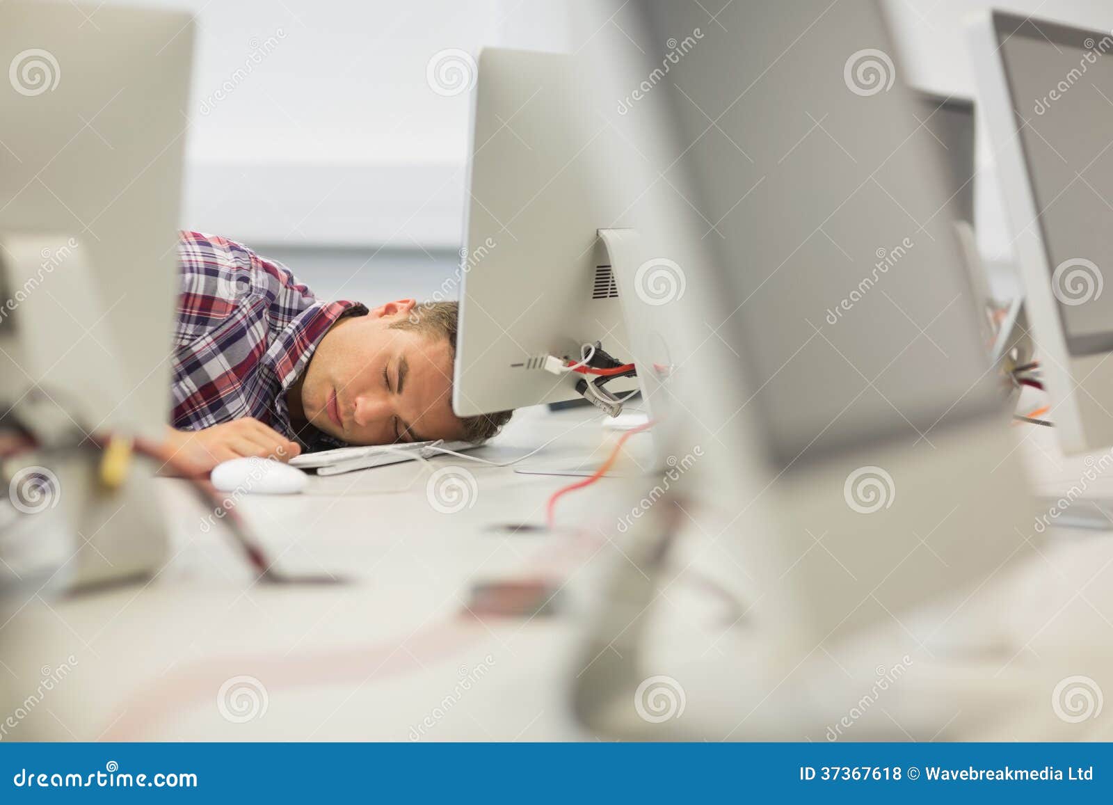 Handsome Student Napping in the Computer Room Stock Photo - Image of ...