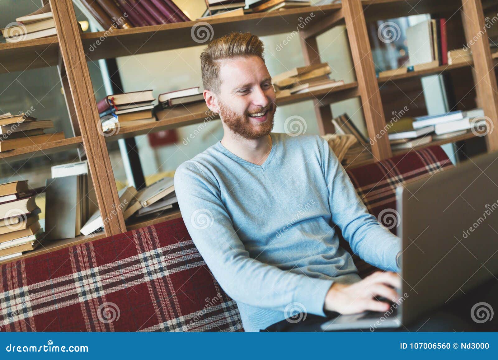 Handsome Student Working on Laptop in Bar Stock Photo - Image of work ...