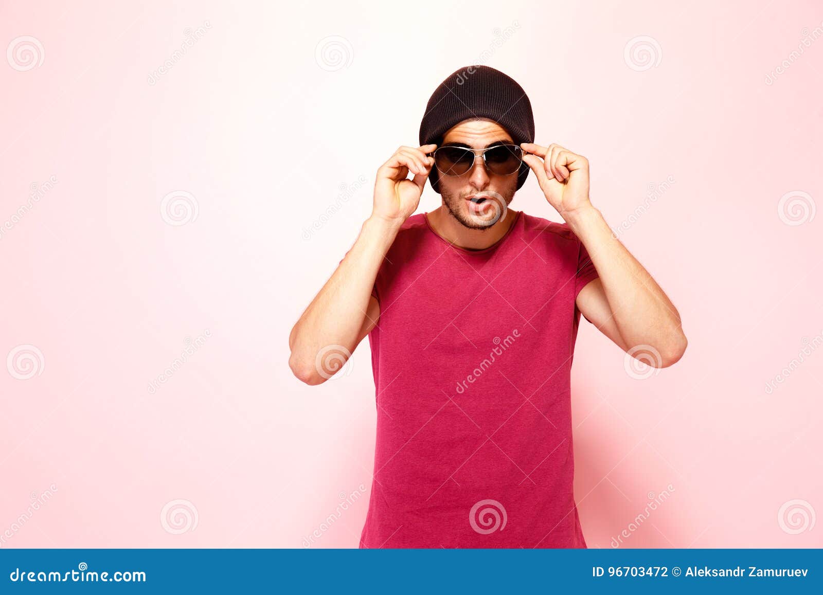 Handsome Stylish Guy in Sunglasses Looking at Camera. Stock Photo ... Handsome Stylish Guy in Sunglasses Looking at Camera. Stock Photo ...