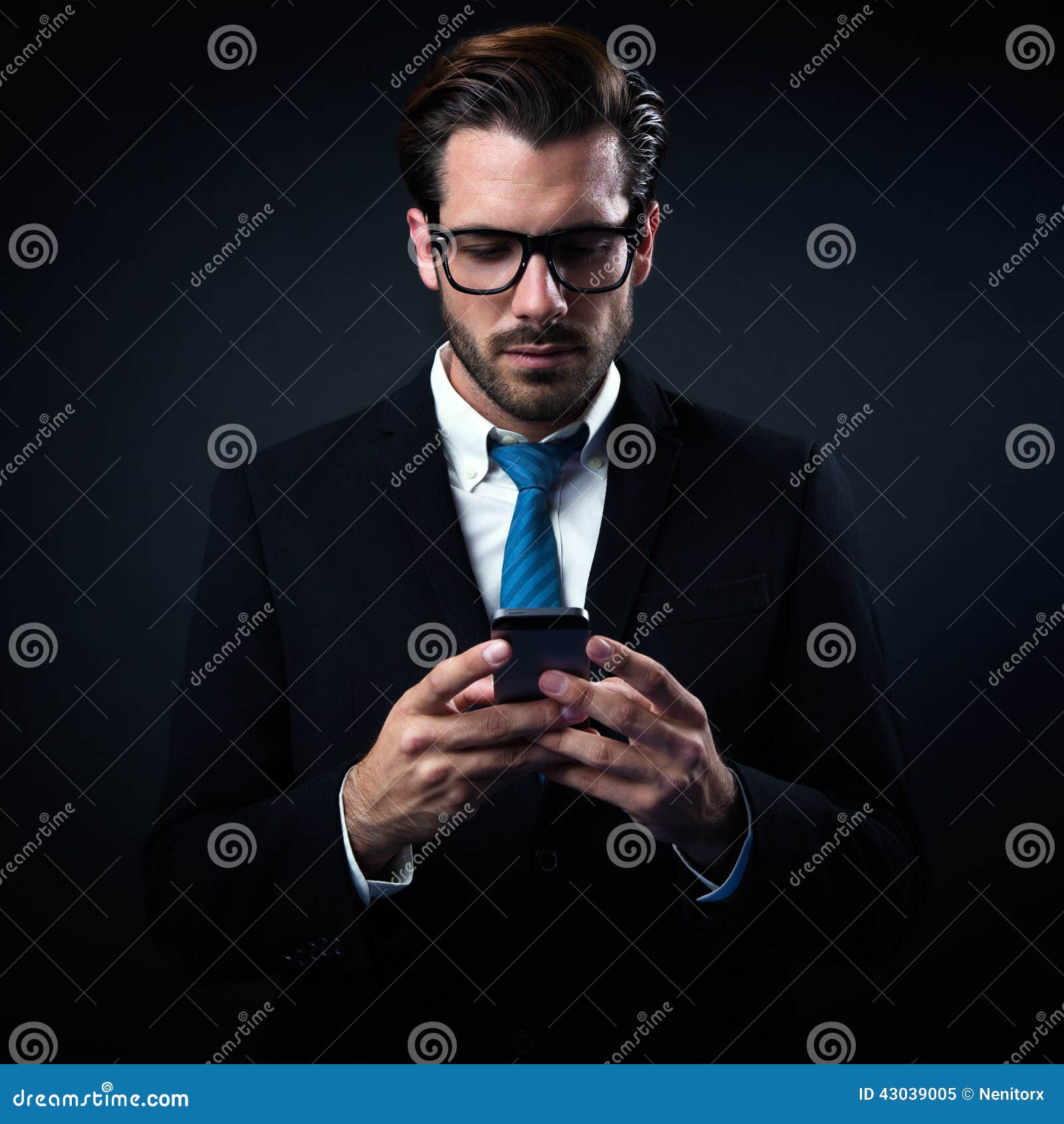 Handsome Stylish Man in Elegant Black Suit Using Mobile Phone. Stock ...