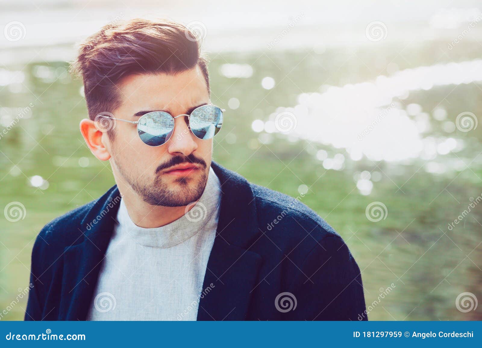 Handsome Stylish Man With Sunglasses And Modern Hairstyle And Beard