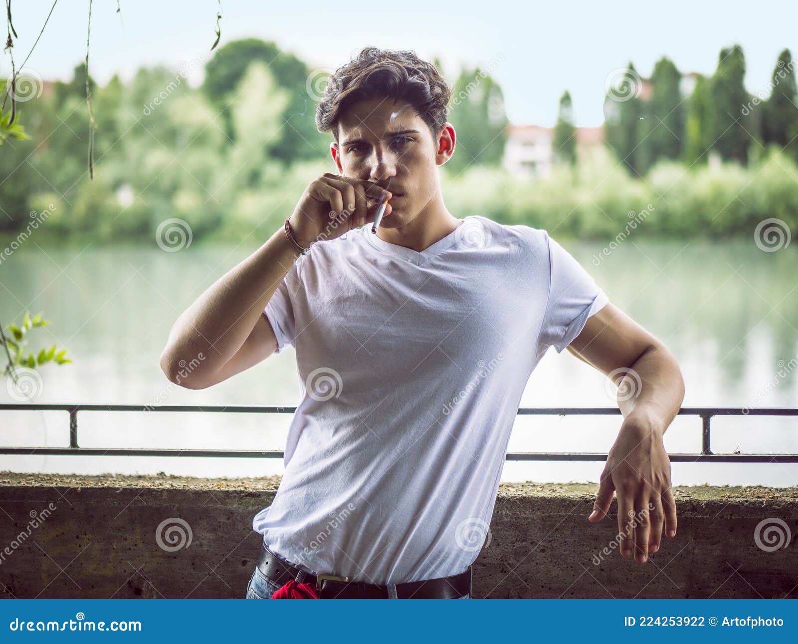 Handsome Stylish Young Man Smoking Cigarette Outside Stock Photo ...