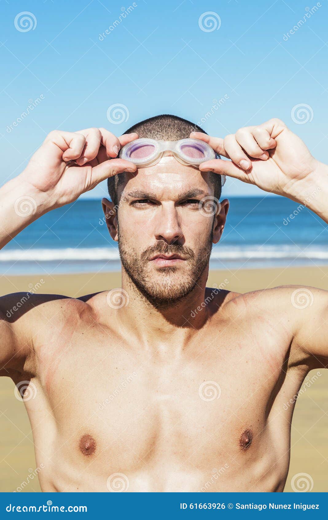 Handsome Swimmer Putting on Goggles Stock Photo - Image of single ...