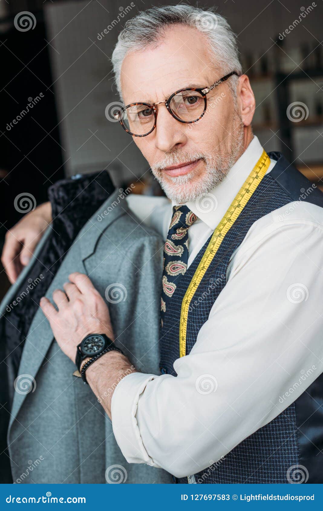 Handsome Tailor Hugging Mannequin with Jacket Stock Image - Image of ...