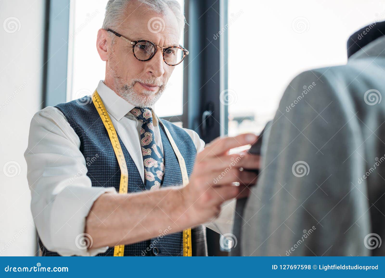 Handsome Tailor Touching Jacket on Mannequin Stock Photo - Image of ...