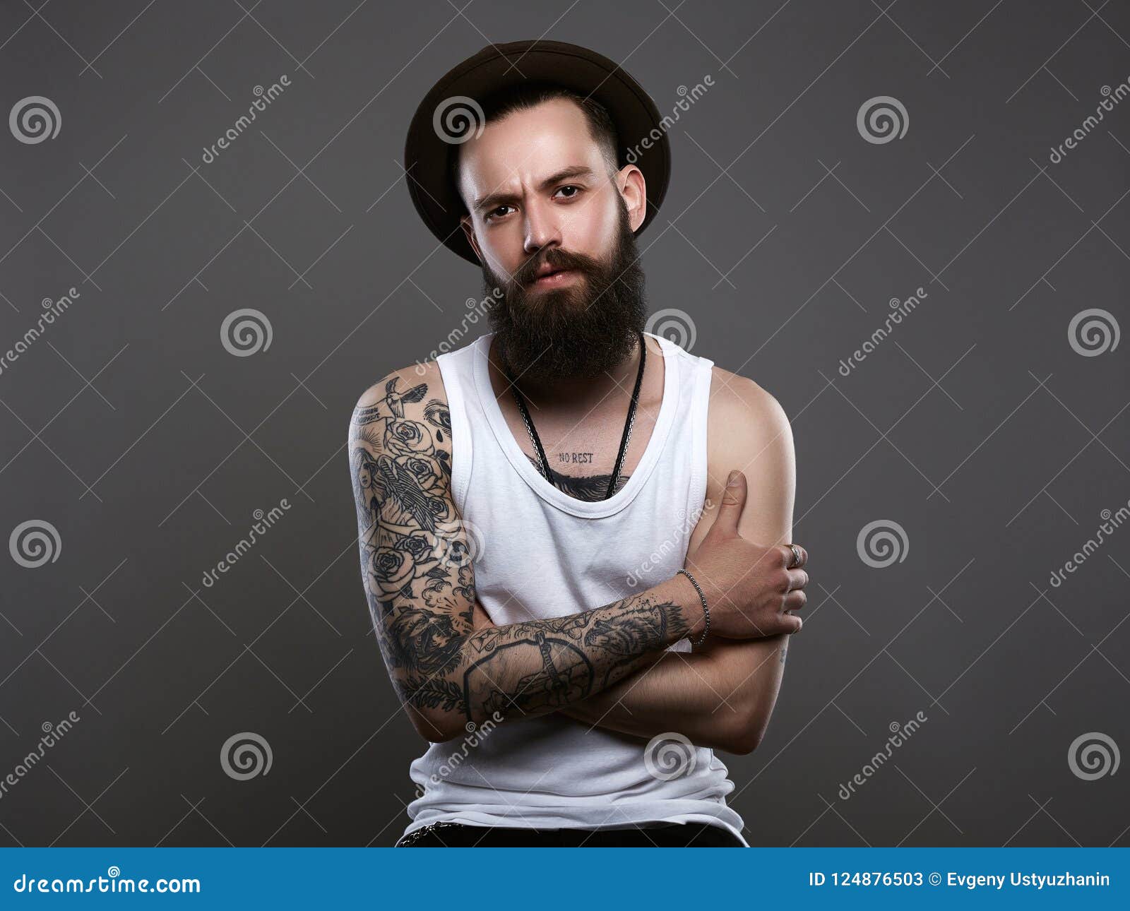 Handsome Tattooed Bearded Man in Hat Stock Image - Image of elegant ... Handsome Tattooed Bearded Man in Hat Stock Image - Image of elegant ...