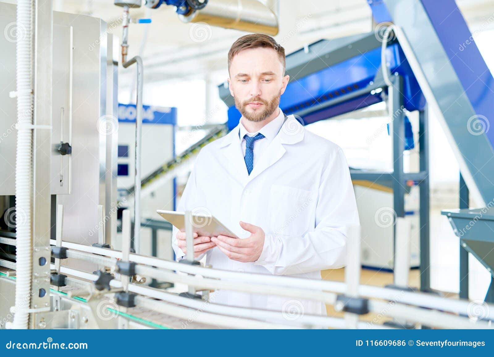 Handsome Technologist Controlling Production Process Stock Photo ...