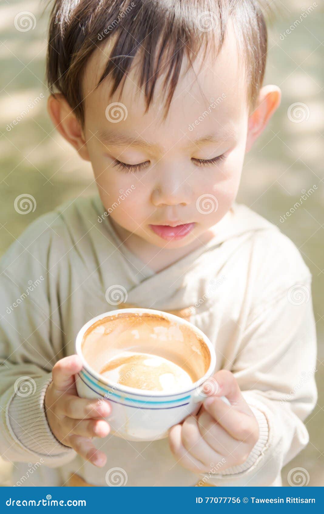 A Handsome Thai Baby Boy Holding Coffee Cup Stock Photo - Image of ...