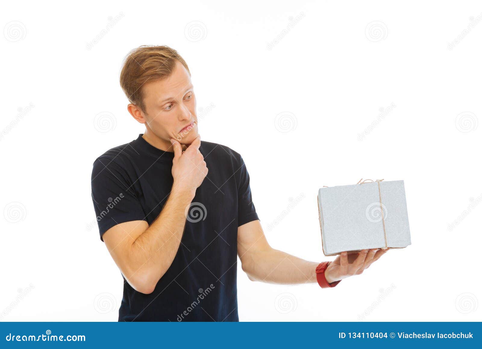 Handsome Thoughtful Man Looking at His Present Stock Photo - Image of ...