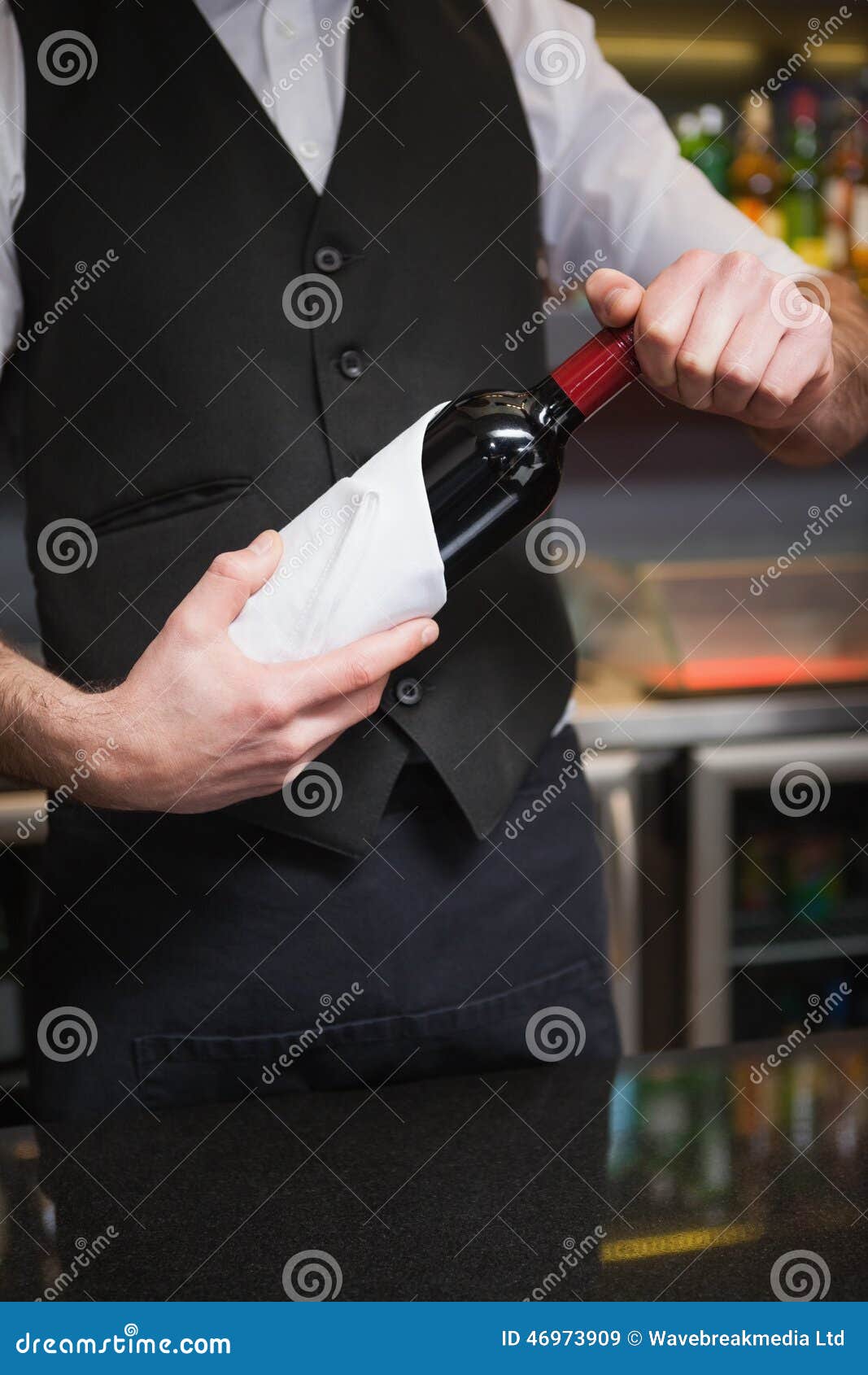 Handsome Waiter Opening a Bottle of Red Wine Stock Image - Image of ...