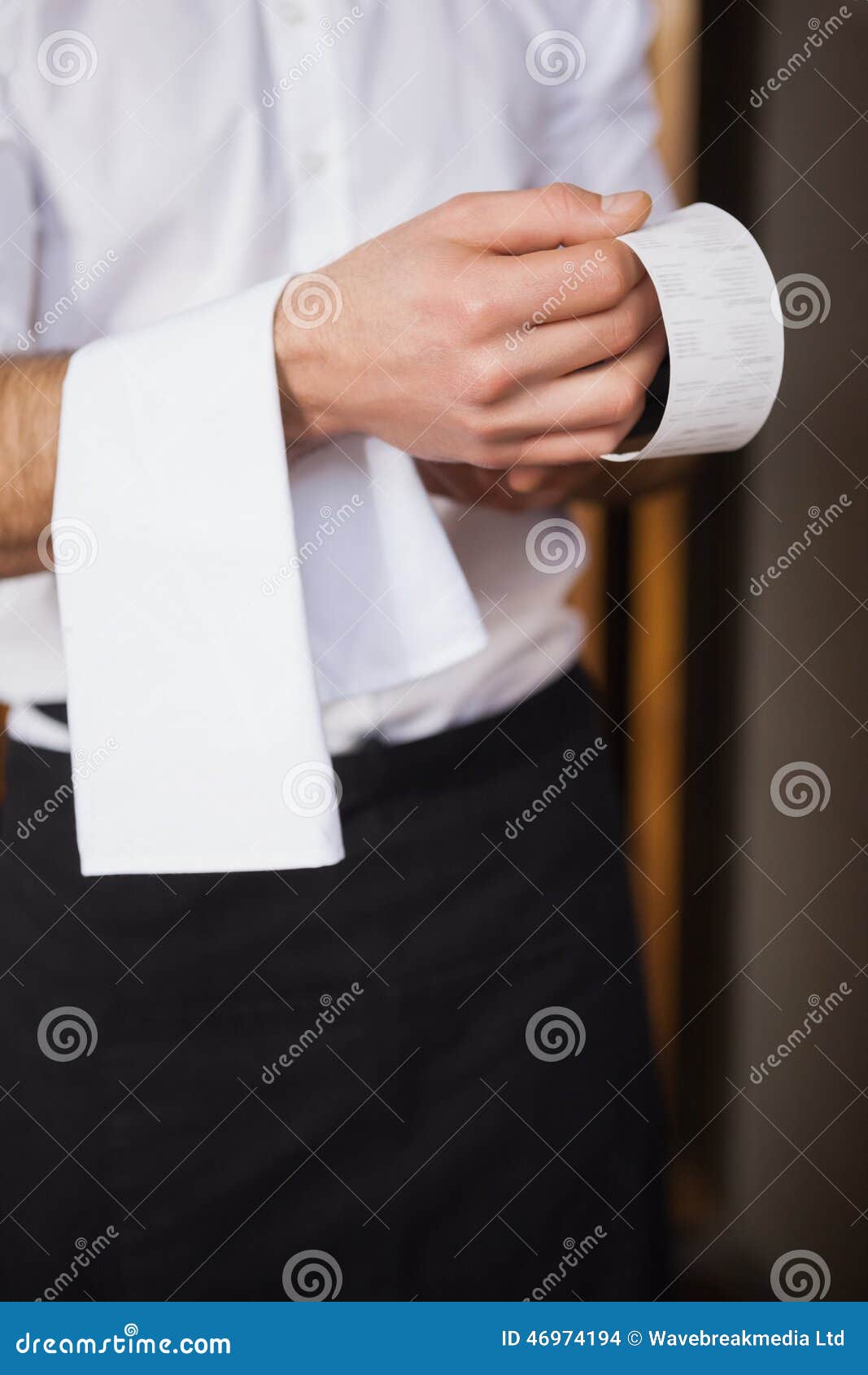 Handsome Waiter Reading a Receipt Stock Photo - Image of food, shirt ...