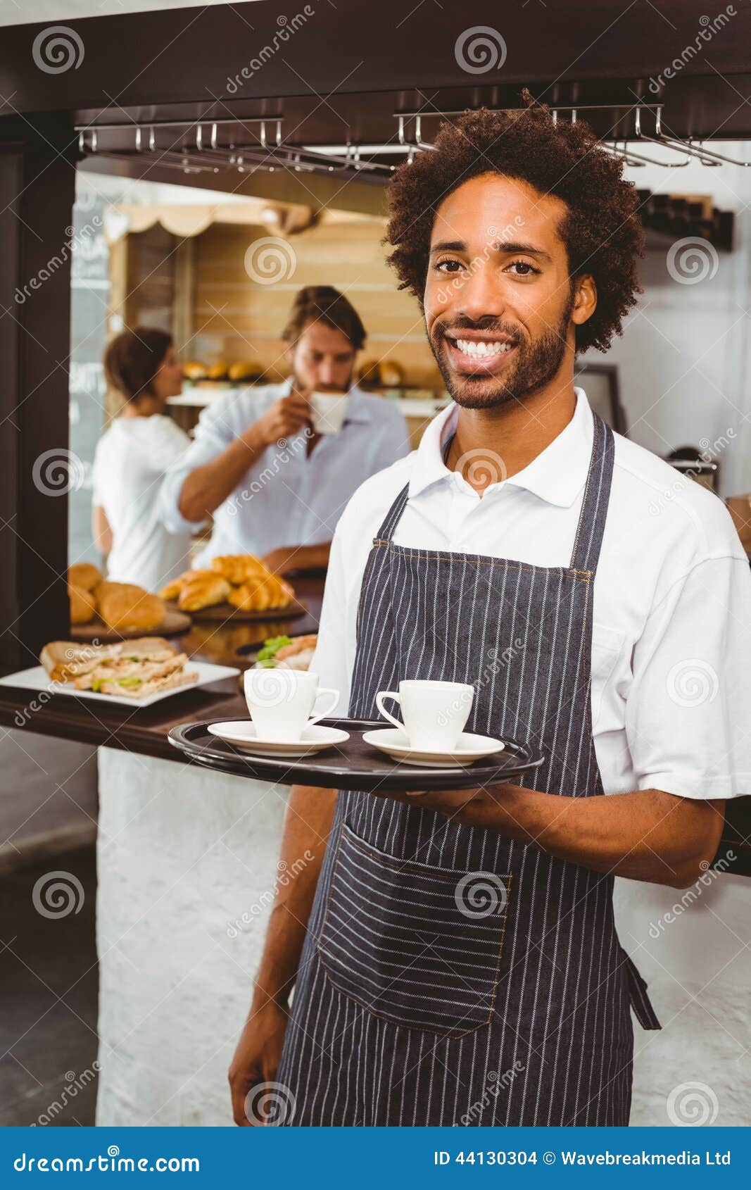Handsome Waiter Smiling at Camera Holding Tray Stock Photo - Image of ...