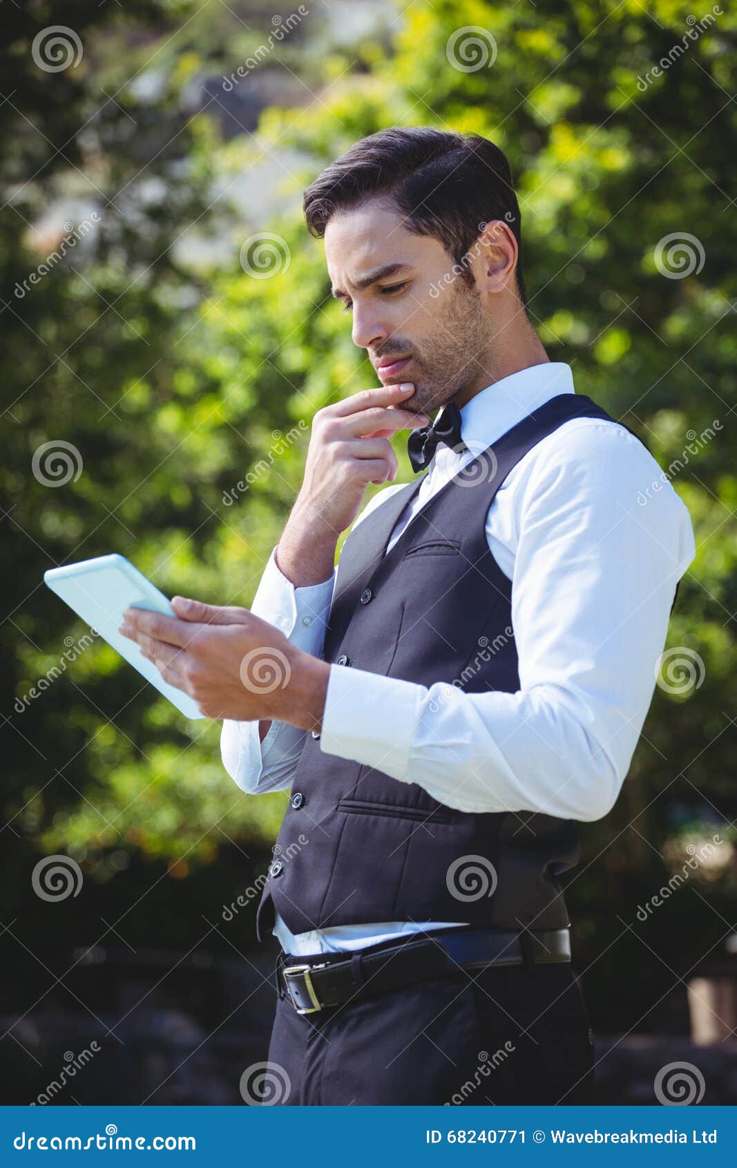Handsome Waiter Using Tablet Computer Stock Image - Image of male ...