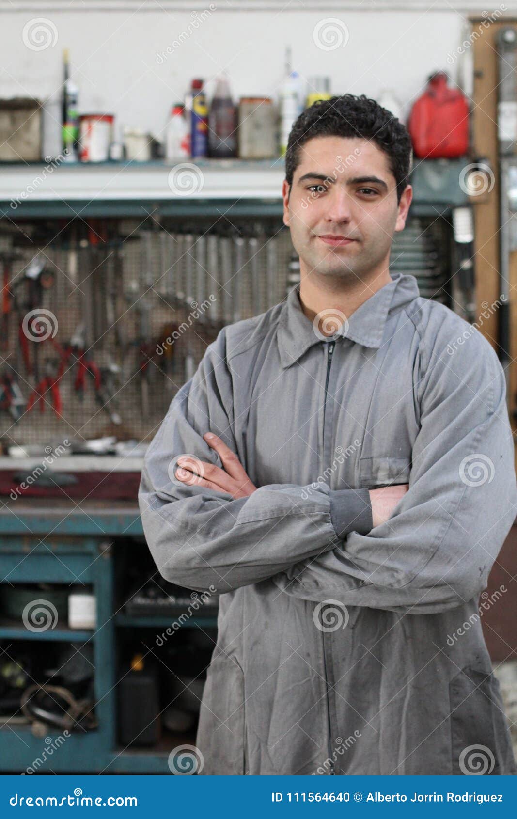 Handsome Worker Standing with Arms Crossed Stock Photo - Image of ...