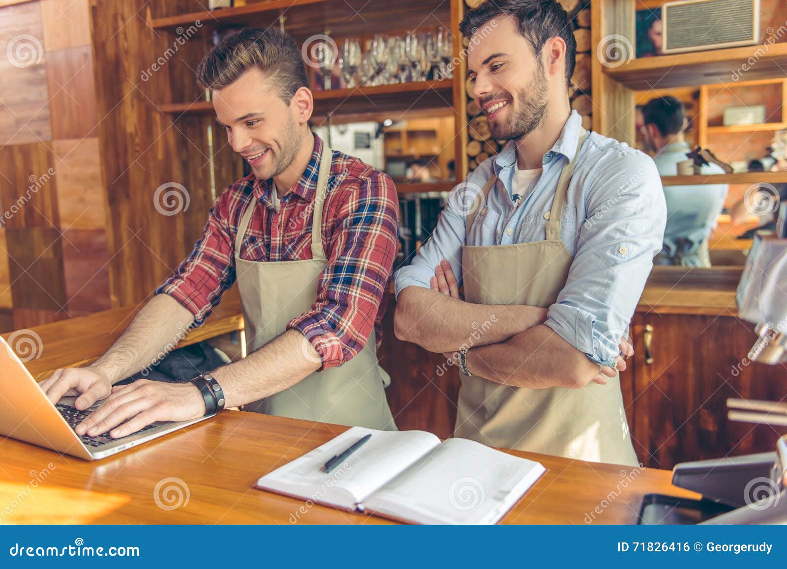 Handsome workers at cafe stock photo. Image of professional - 71826416