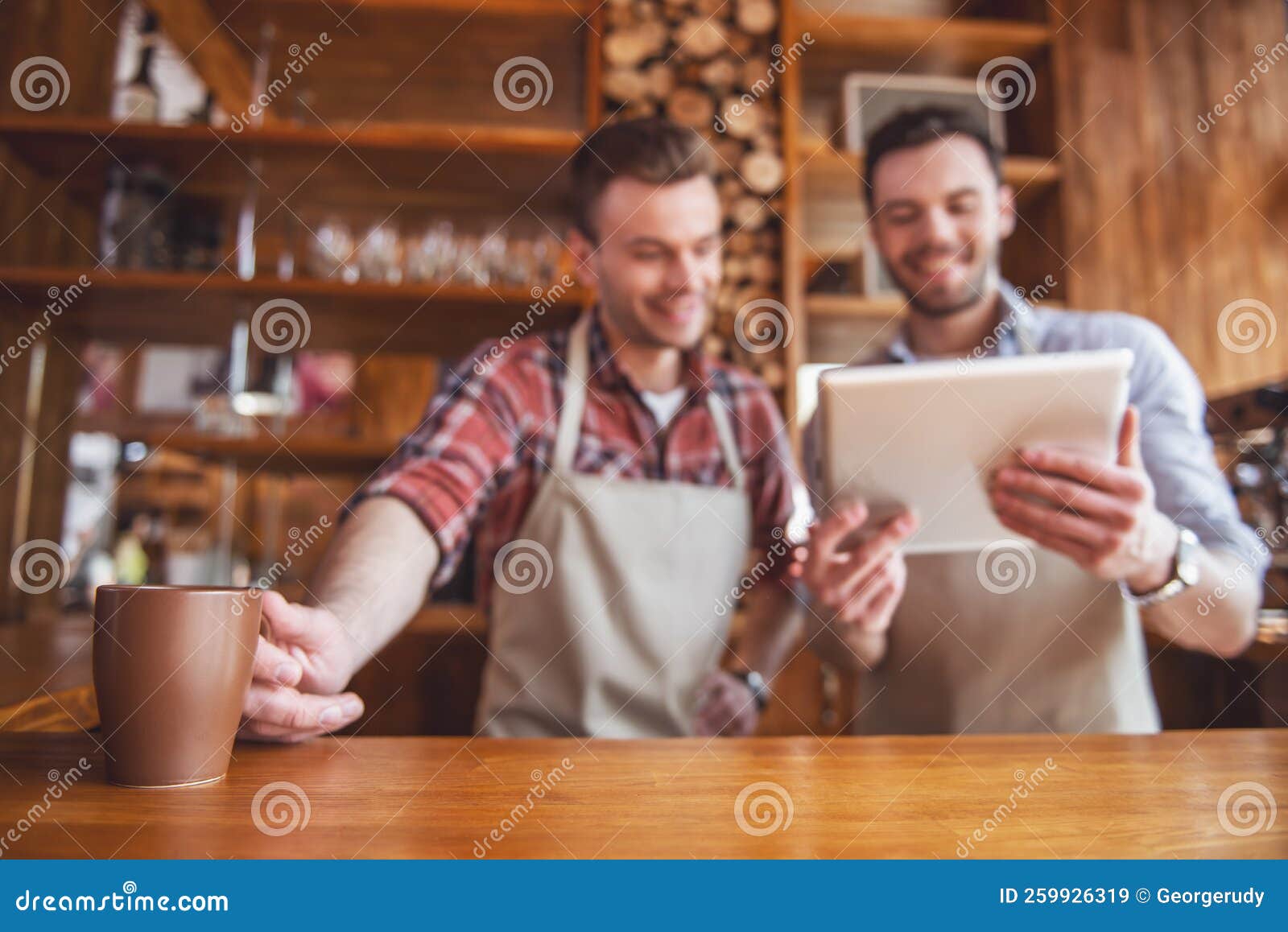 Handsome workers at cafe stock image. Image of people - 259926319