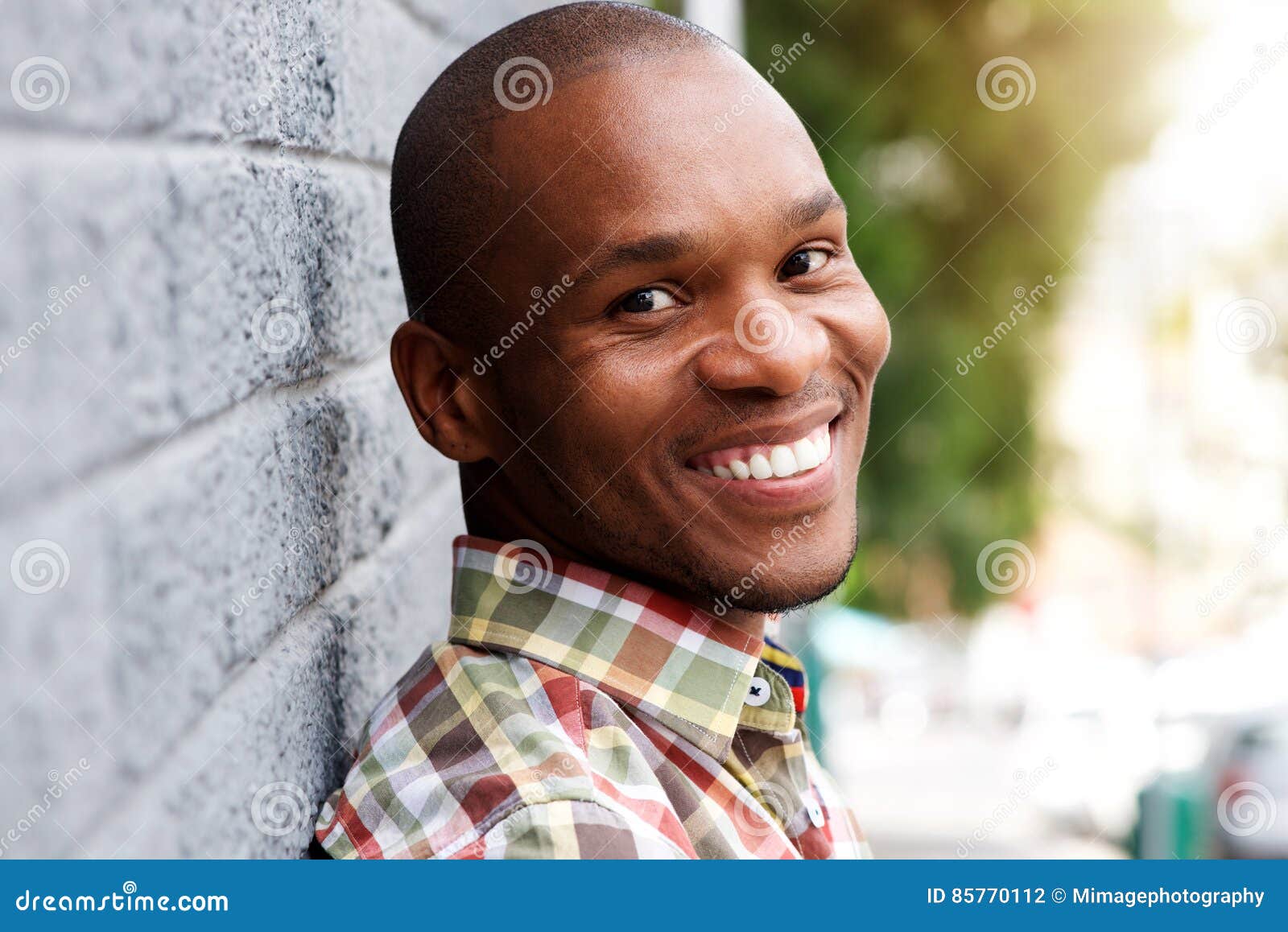 Handsome Young African Man Smiling Stock Photo - Image of casual ...