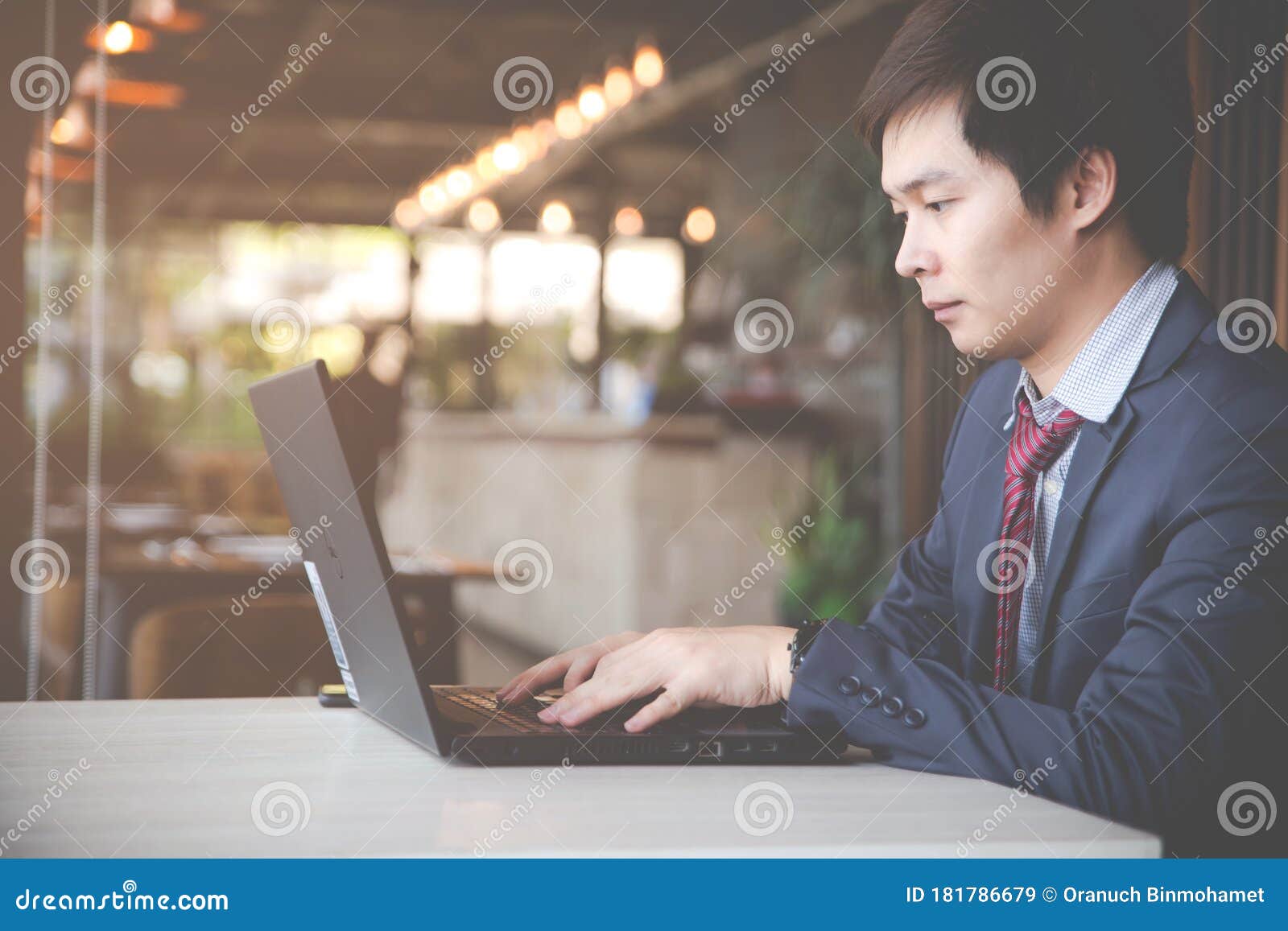Handsome Young Asia Man Working Using Computer or Laptop Stock Image ...