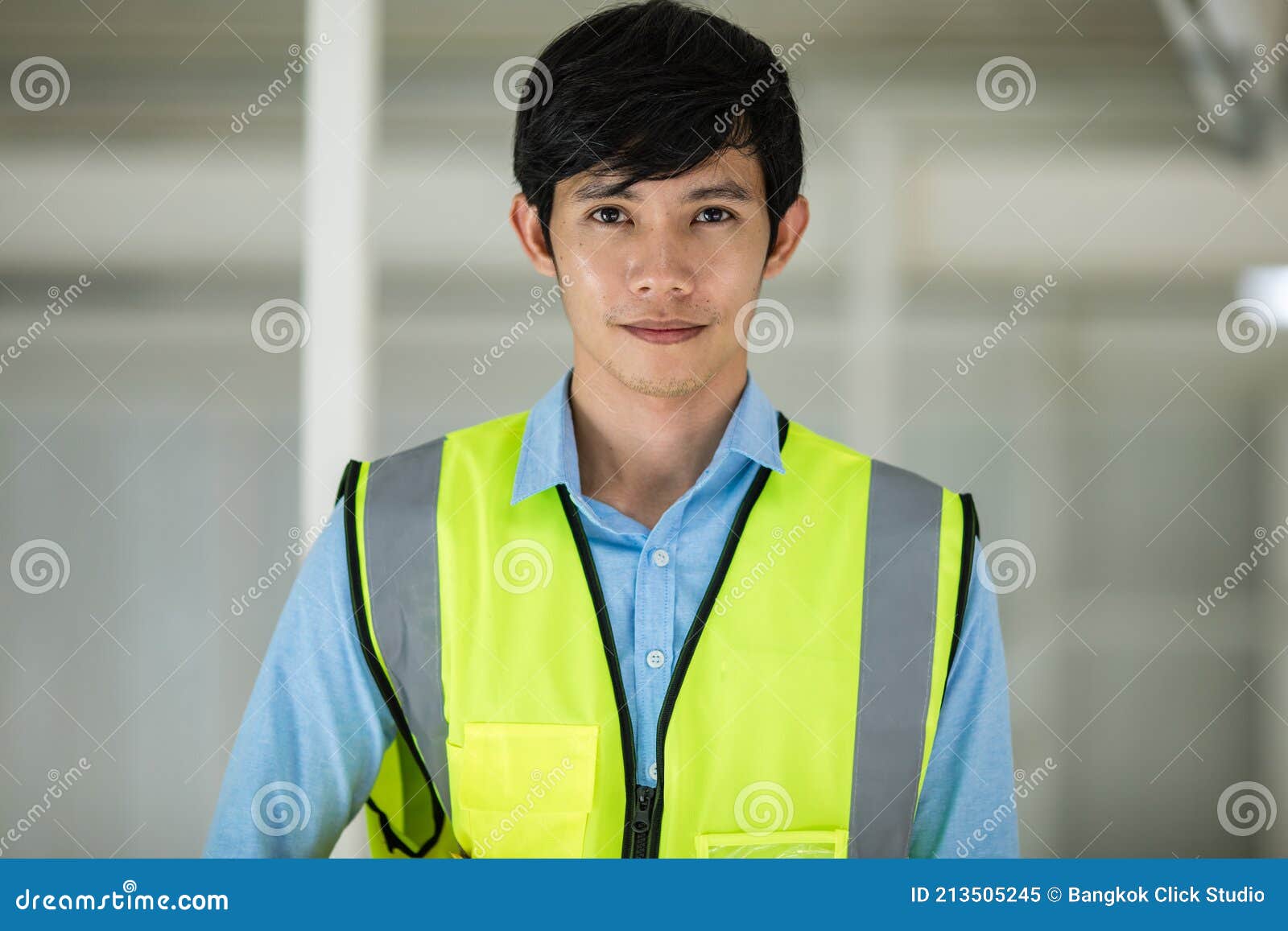 Handsome Young Asian Engineer in Yellow Reflective Vest Working in ...