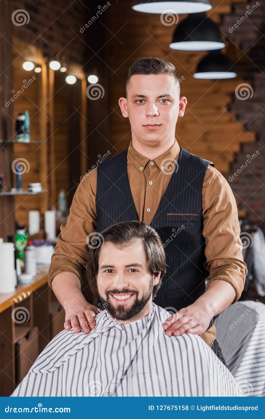 Handsome Young Barber Standing Behind Client Stock Photo - Image of ...