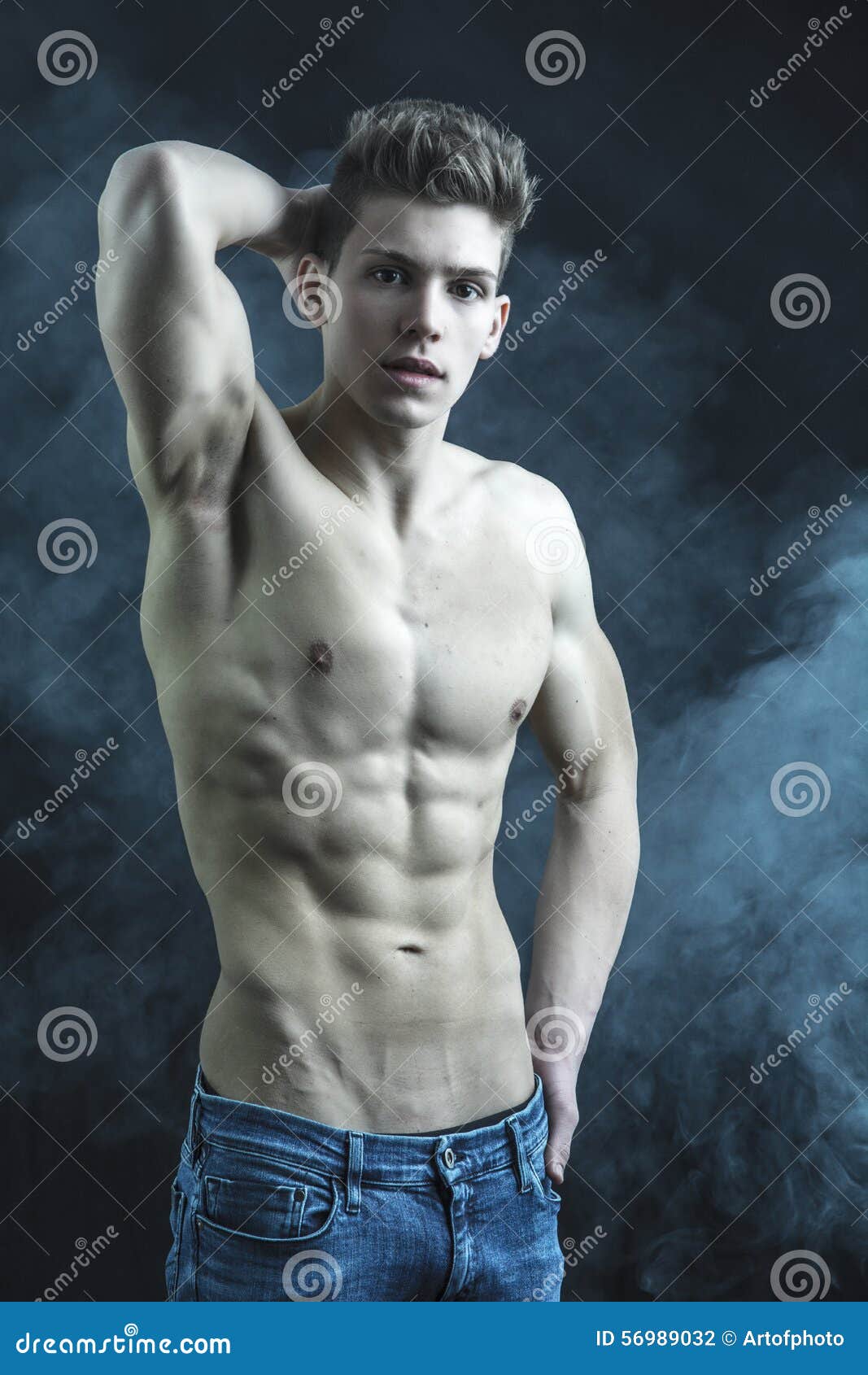 Shirtless Young Man Hugging Himself Royalty-Free Stock Photography ...