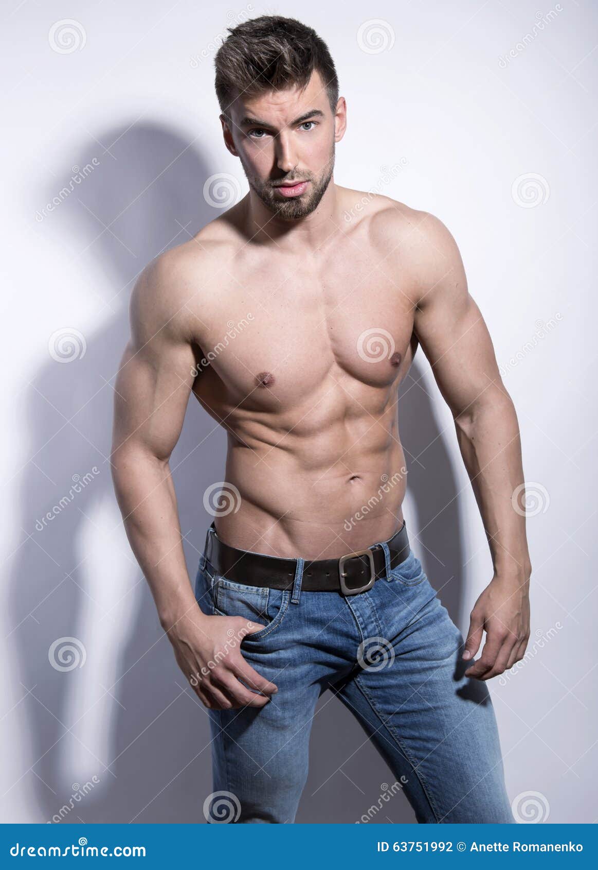 Handsome Young Bodybuilder with Toned Body Stock Photo - Image of brown ...