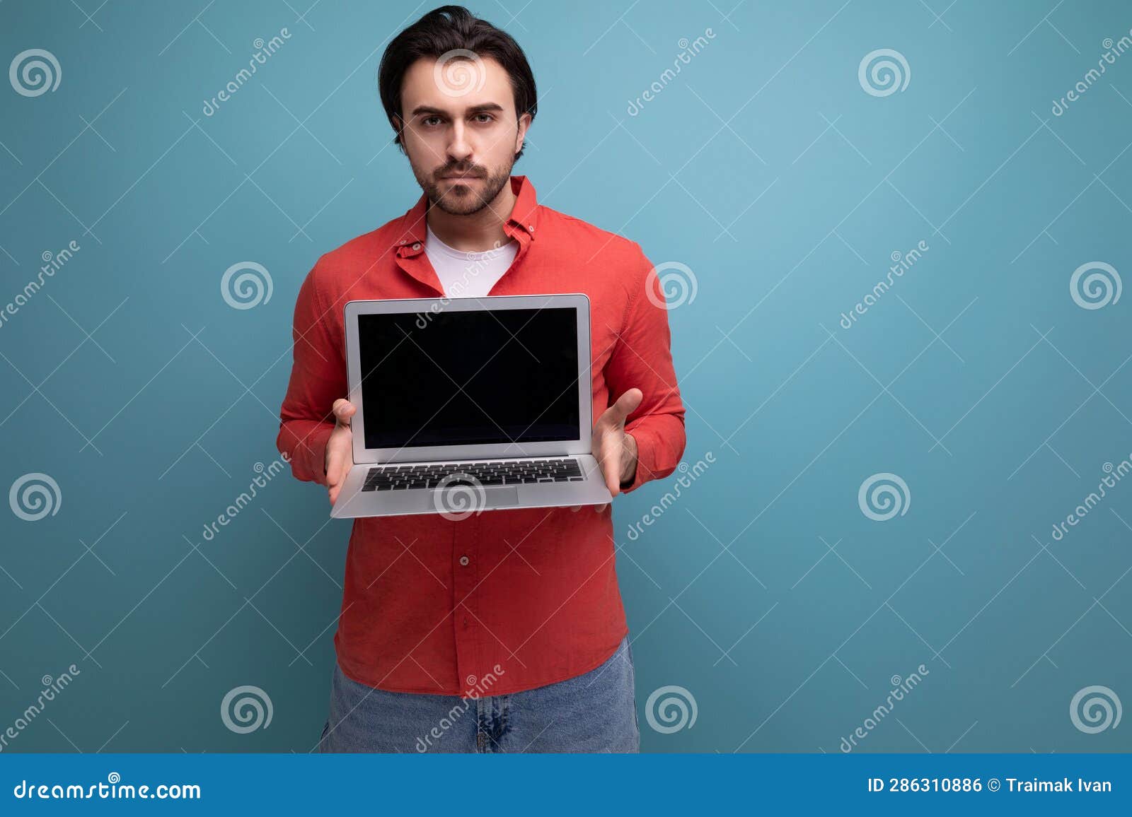 Handsome Young Brunette Man Showing Advertisement on Screen with Mockup ...