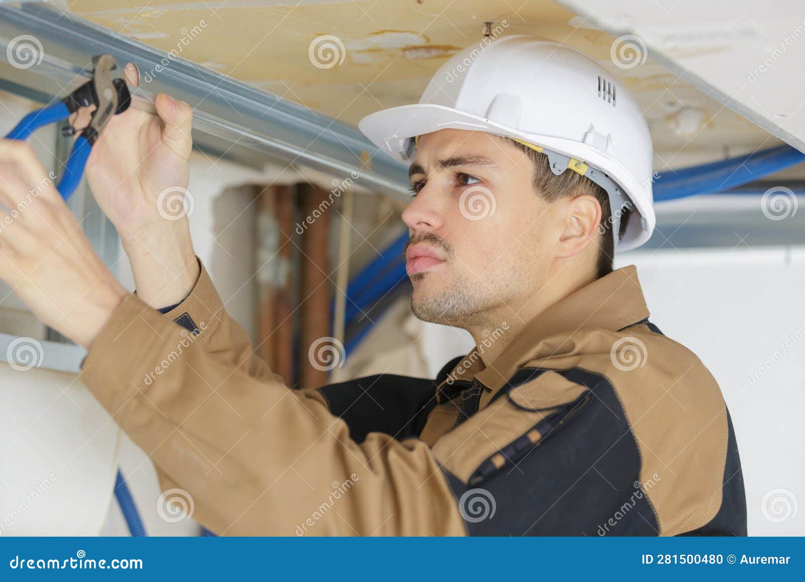Handsome Young Builder Fixing Problem Stock Photo - Image of closeup ...