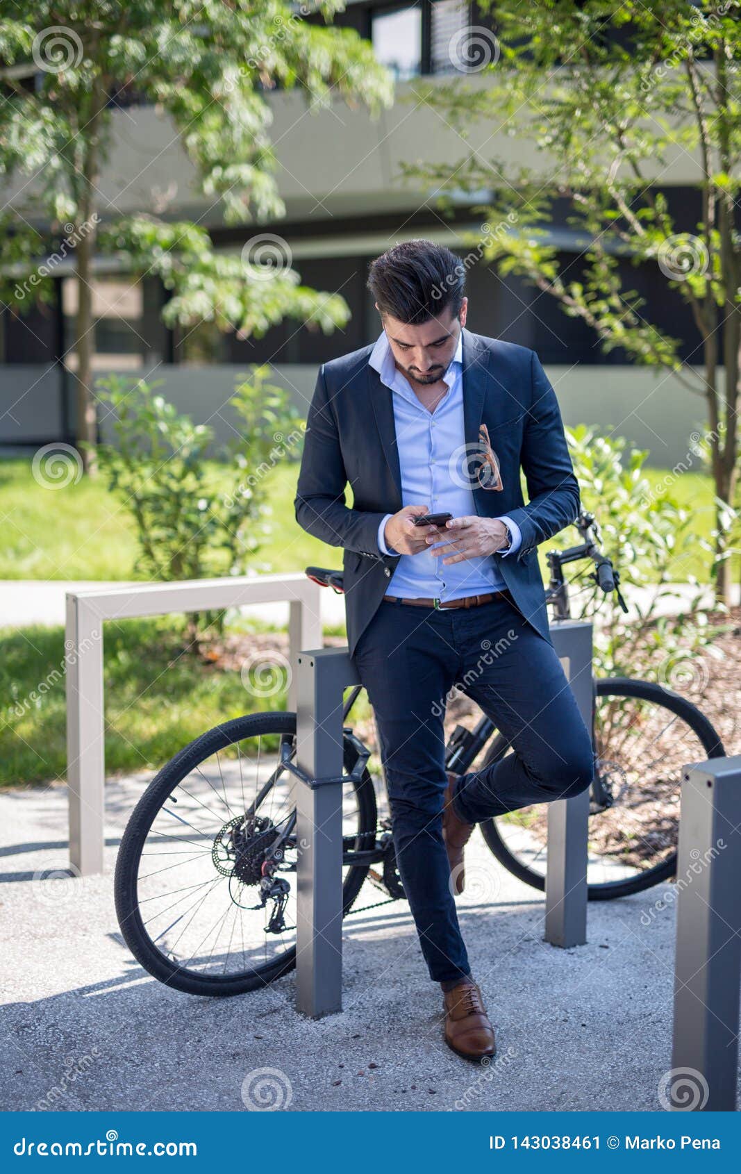 Handsome Young Business Man Texting on His Phone Outside Stock Image ...