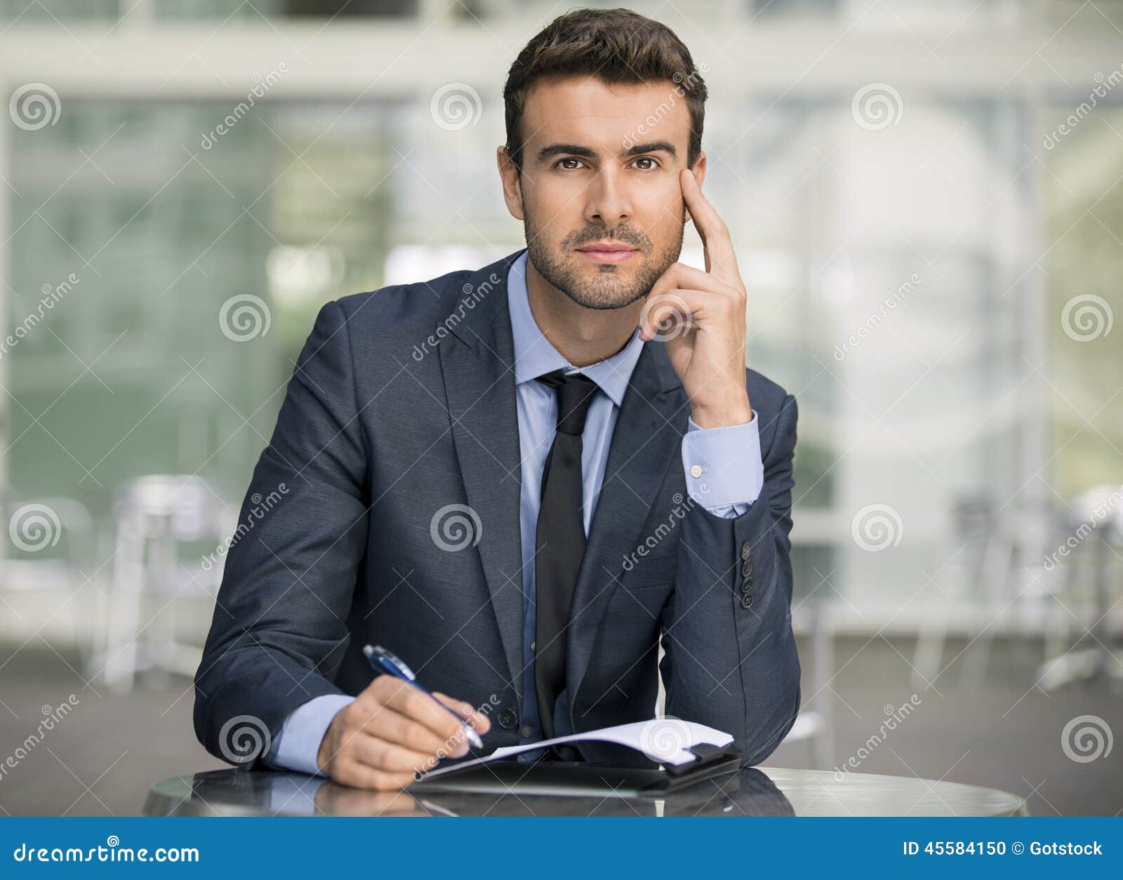 Handsome Young Businessman stock photo. Image of handsome - 45584150