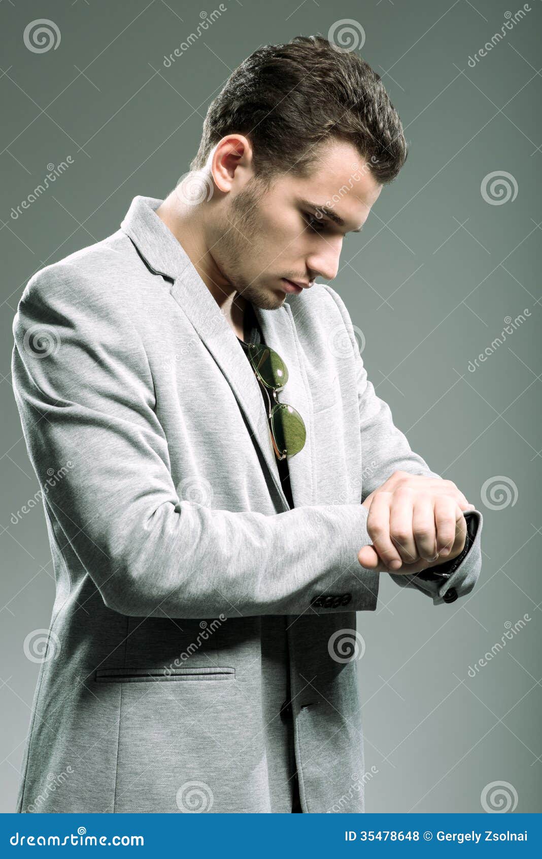 Handsome Young Businessman Looking at His Watch Stock Photo - Image of ...
