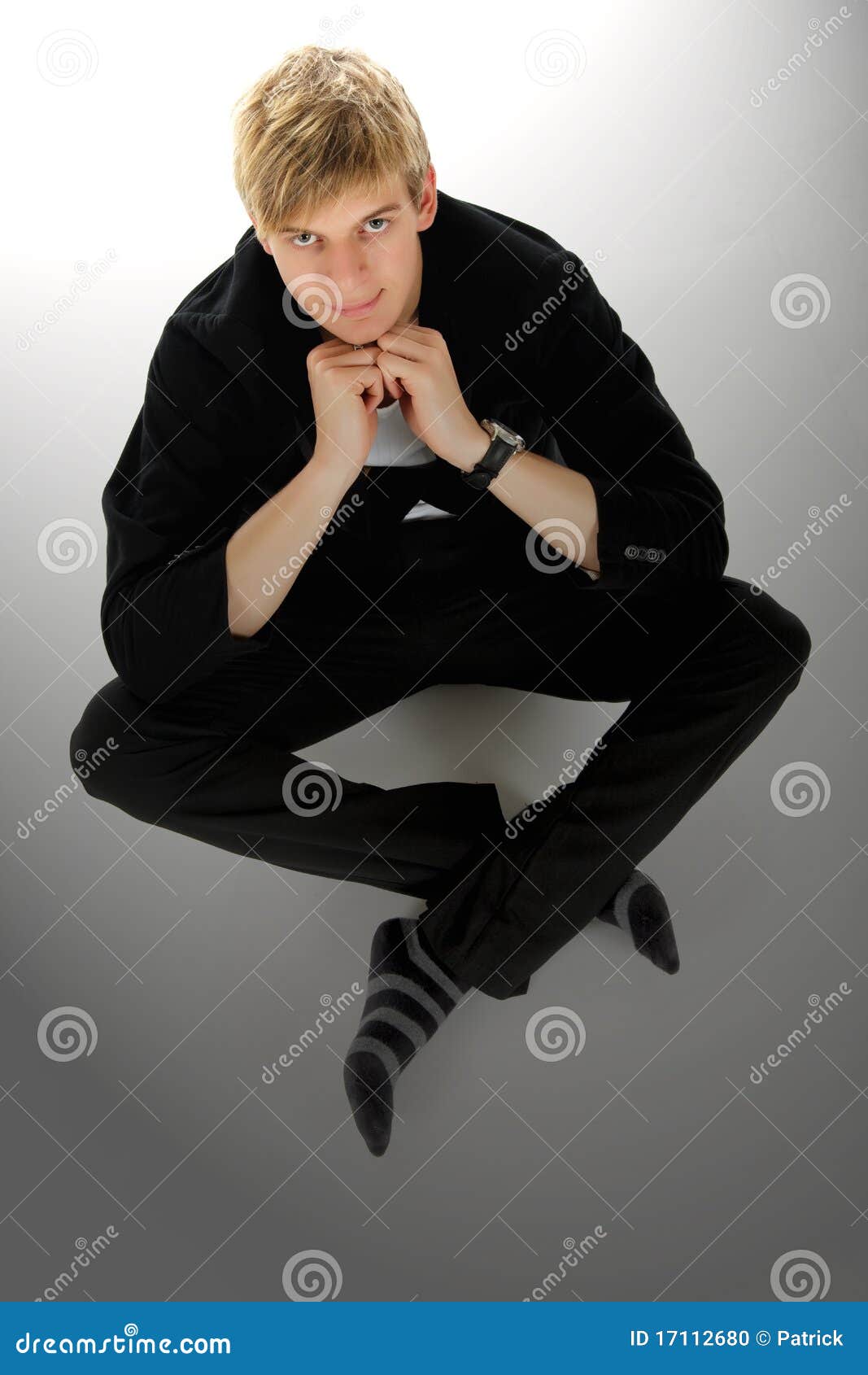 Handsome Young Caucasian Man, Cross-legged Stock Photo - Image of ...