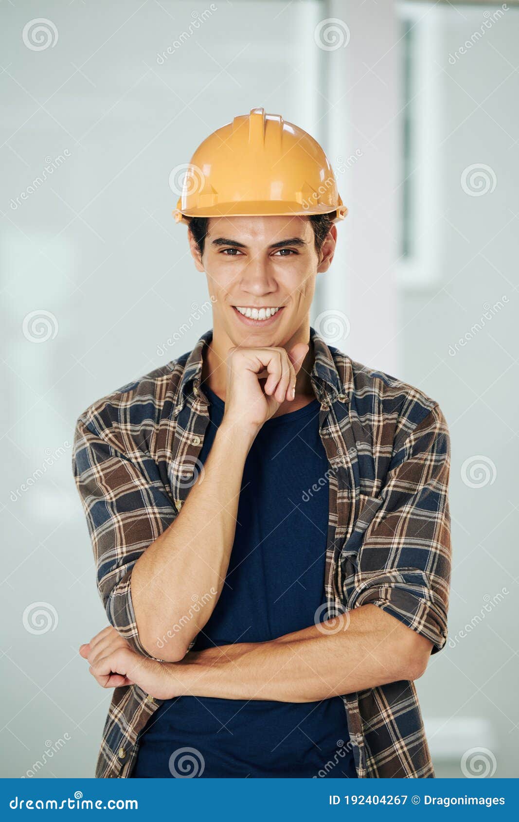 Handsome young contractor stock image. Image of adult - 192404267