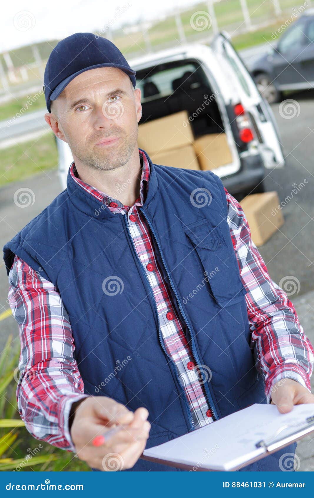 Handsome Young Delivery Man Delivering Package Stock Image - Image of ...