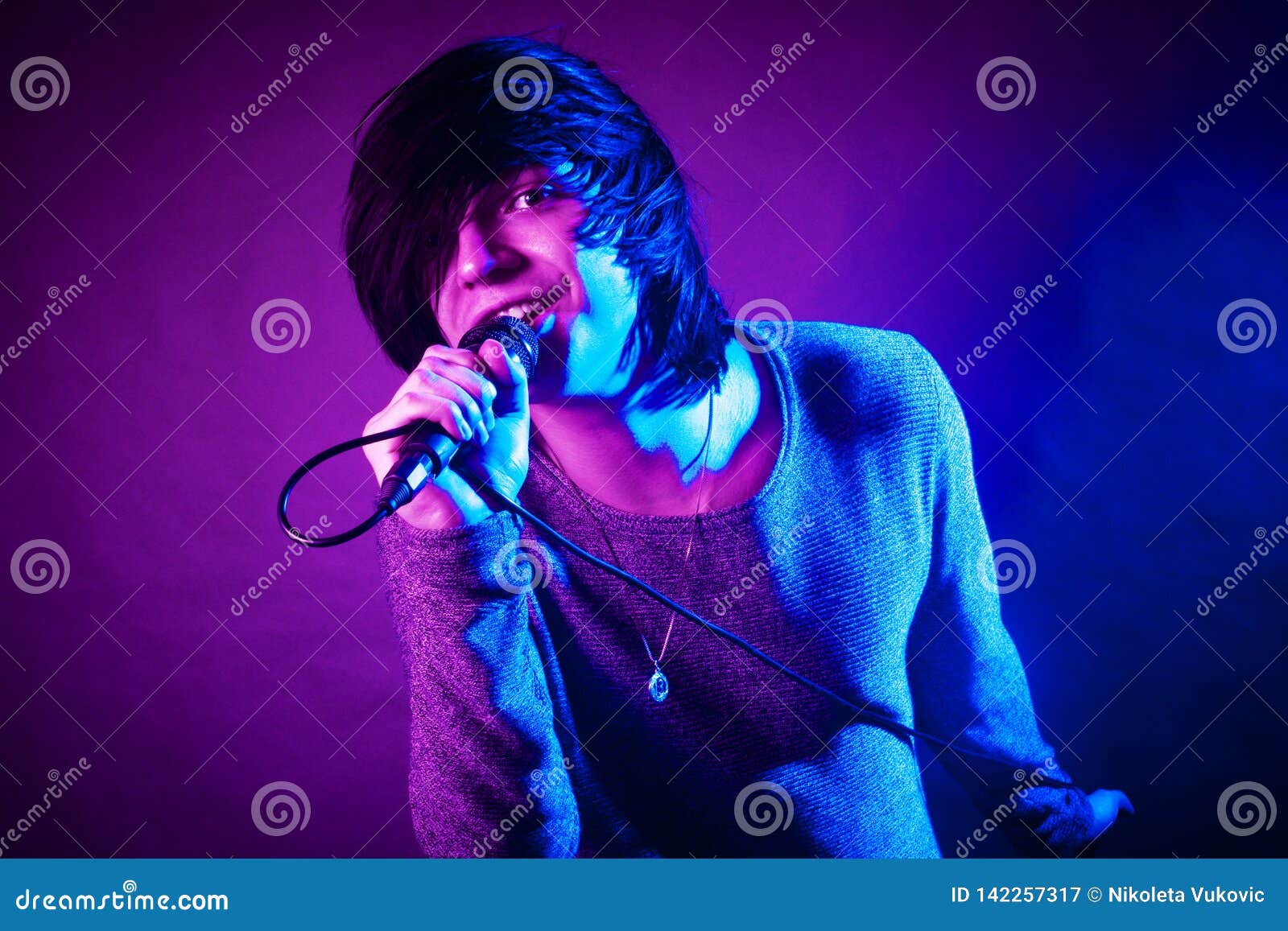 Handsome Young Emo Guy Singing Stock Image - Image of loud, performing ...