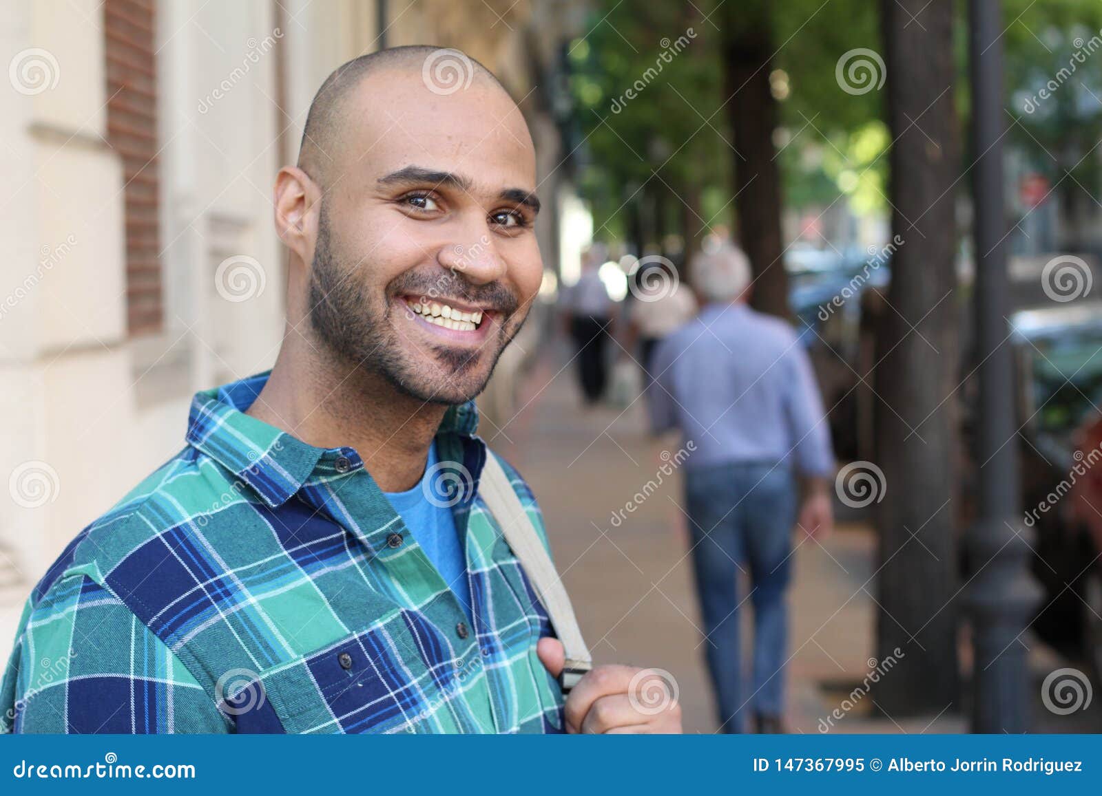 Handsome Young Ethnic Man Smiling with Copy Space Stock Image - Image ...