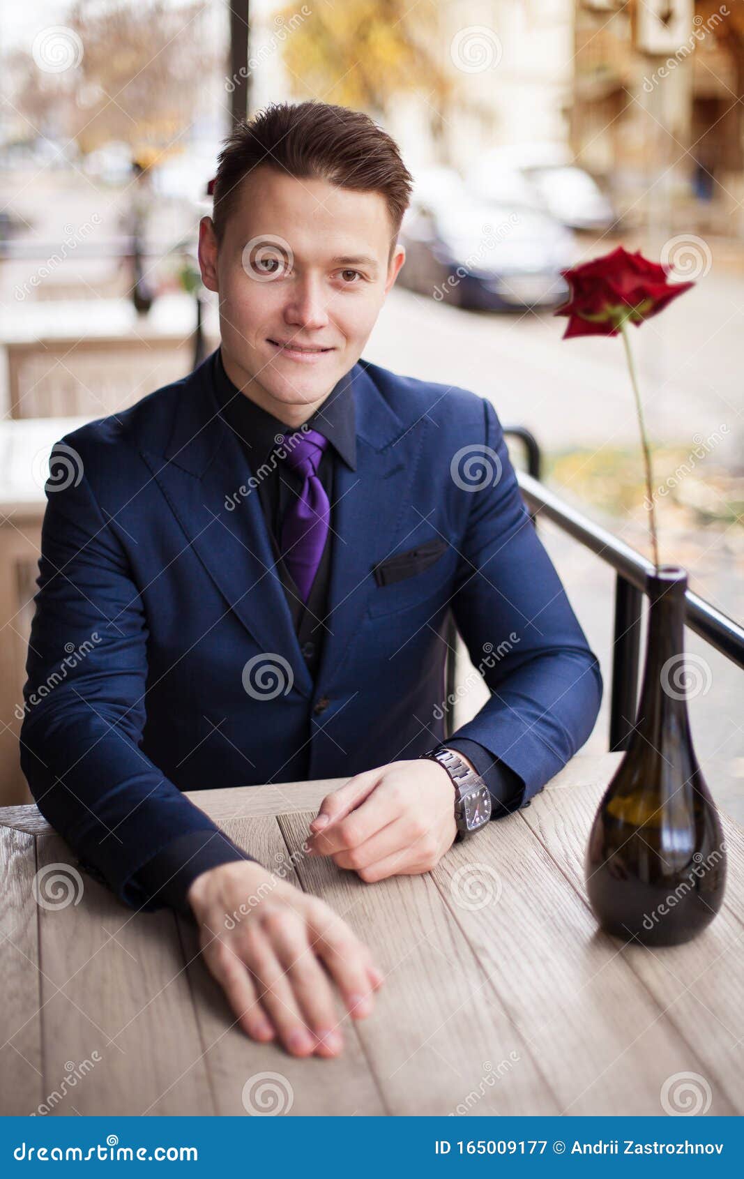 Handsome Young Guy Groom in a Suit Alone on a Date at a Cafe Stock ...