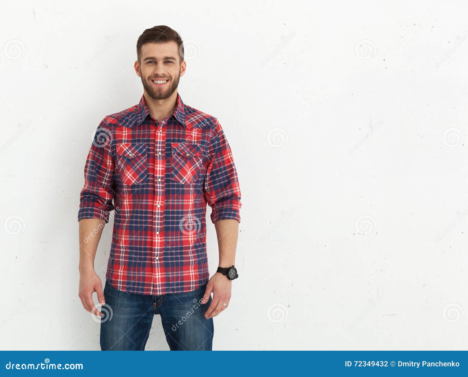 Handsome Young Guy Standing Against White Wall. Stock Photo - Image of ...