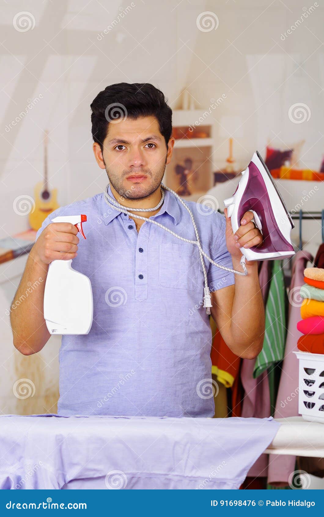 Handsome Young Happy Man Ironing Clothes on Ironing Board Stock Photo ...