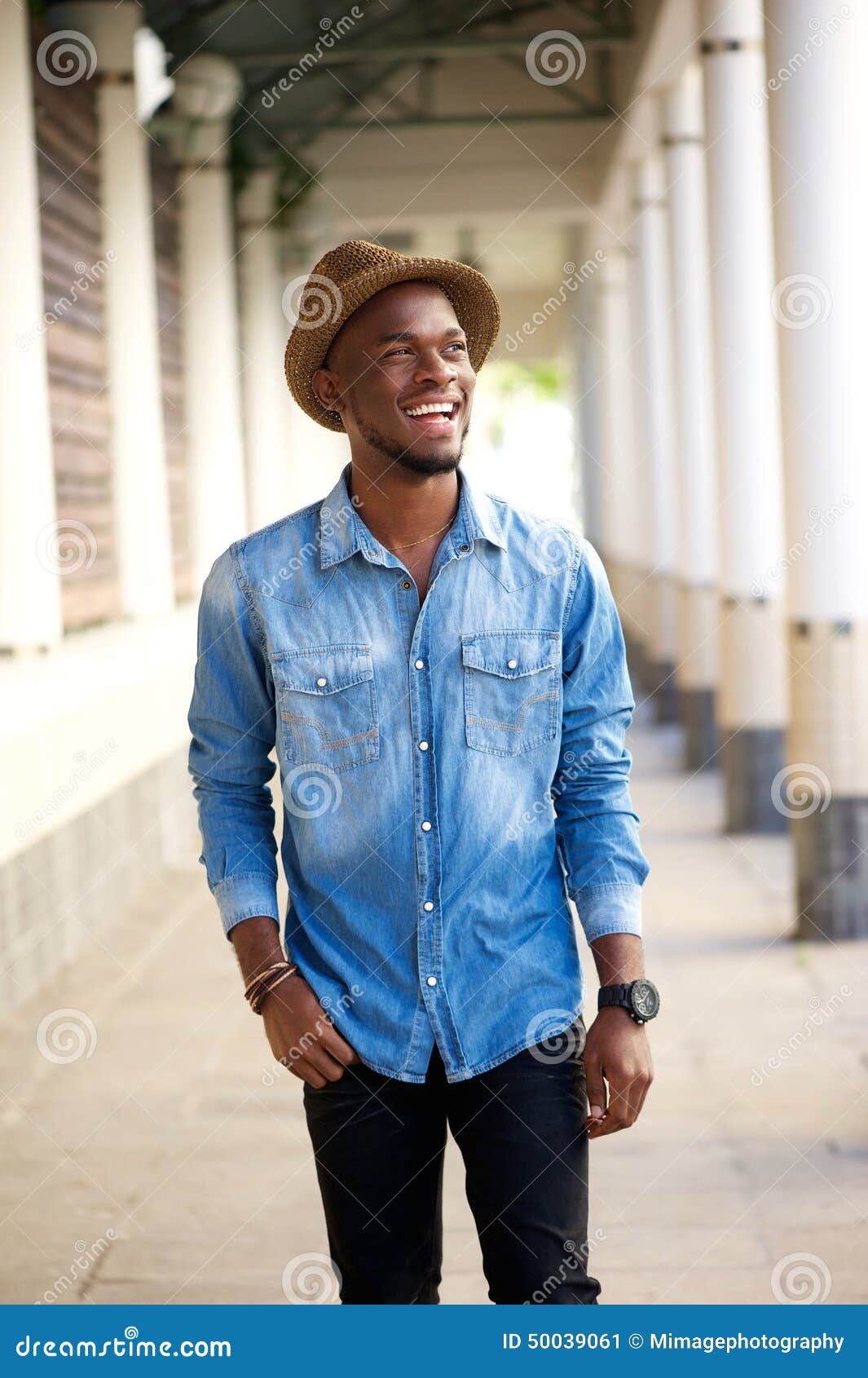 Handsome Young Happy Man Walking Outside with Hat Stock Image - Image ...