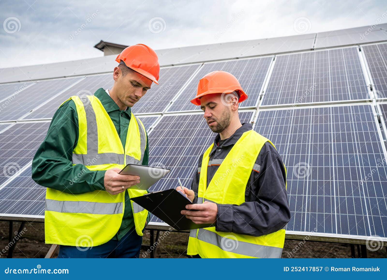 Handsome Young Healthy Guys Workers Working on Installing Solar Panel ...