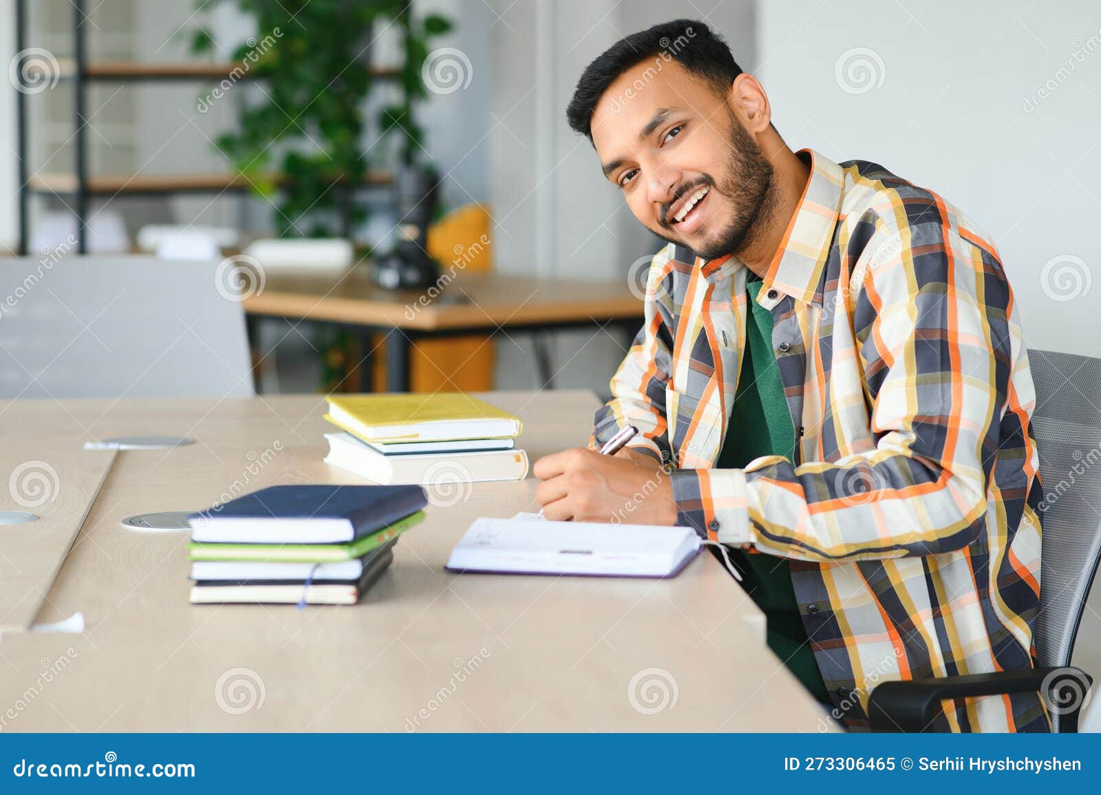 Handsome Young Indian Boy Student with Books and Backpack at University ...