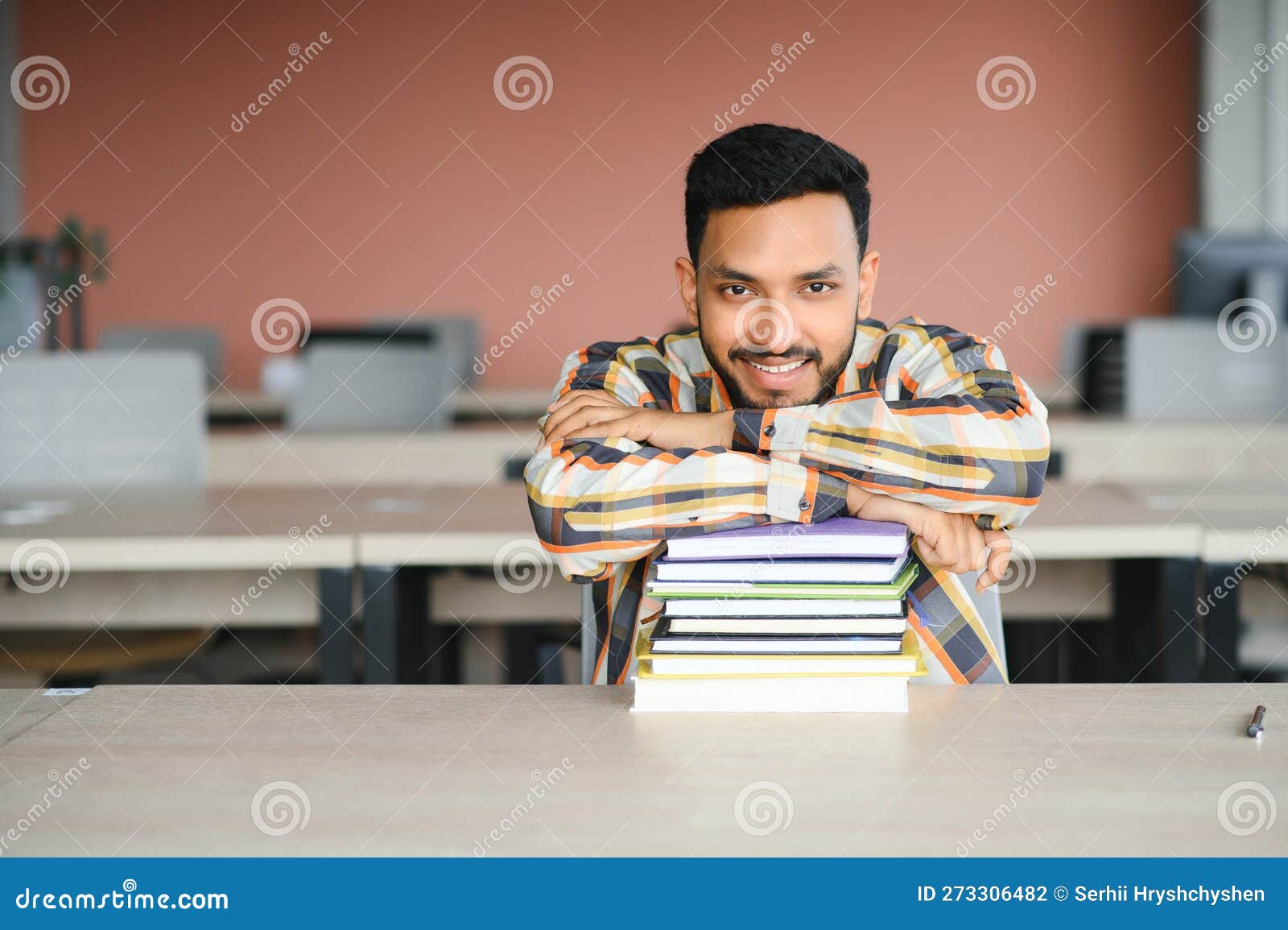 Handsome Young Indian Boy Student with Books and Backpack at University ...