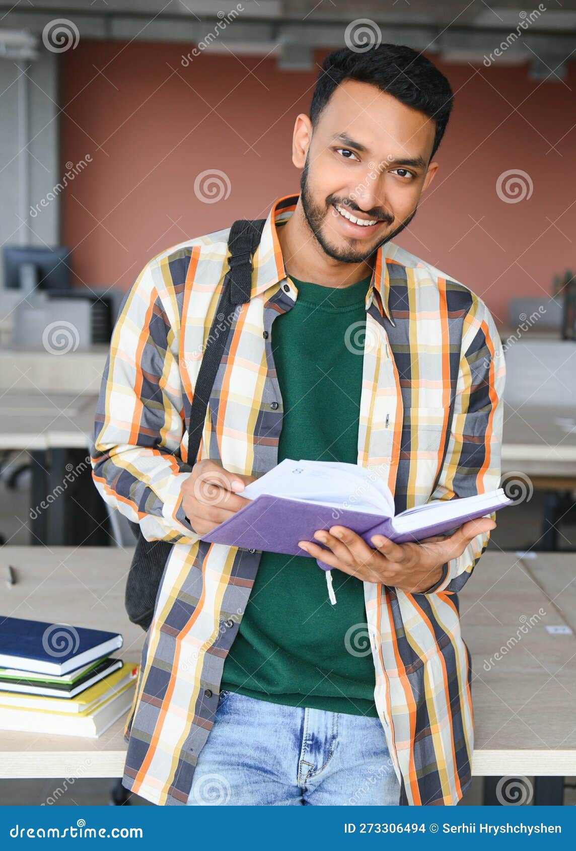 Handsome Young Indian Boy Student with Books and Backpack at University ...