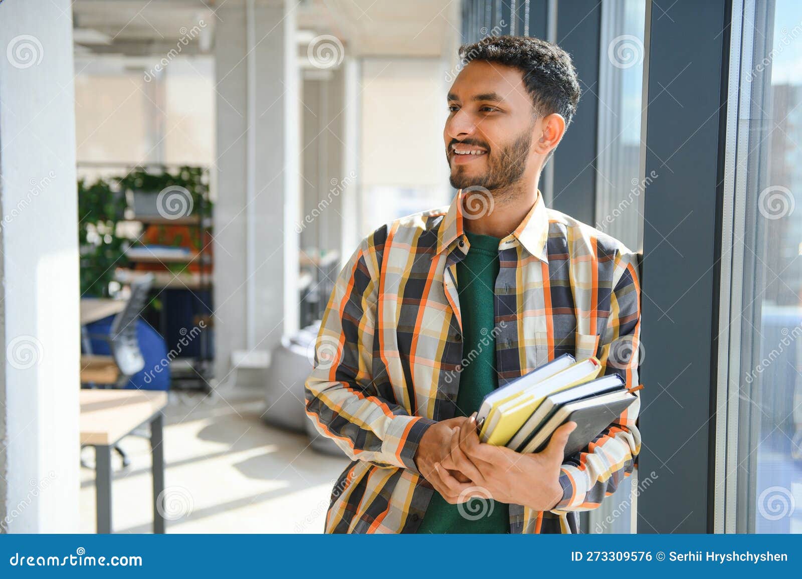 Handsome Young Indian Boy Student with Books and Backpack at University ...