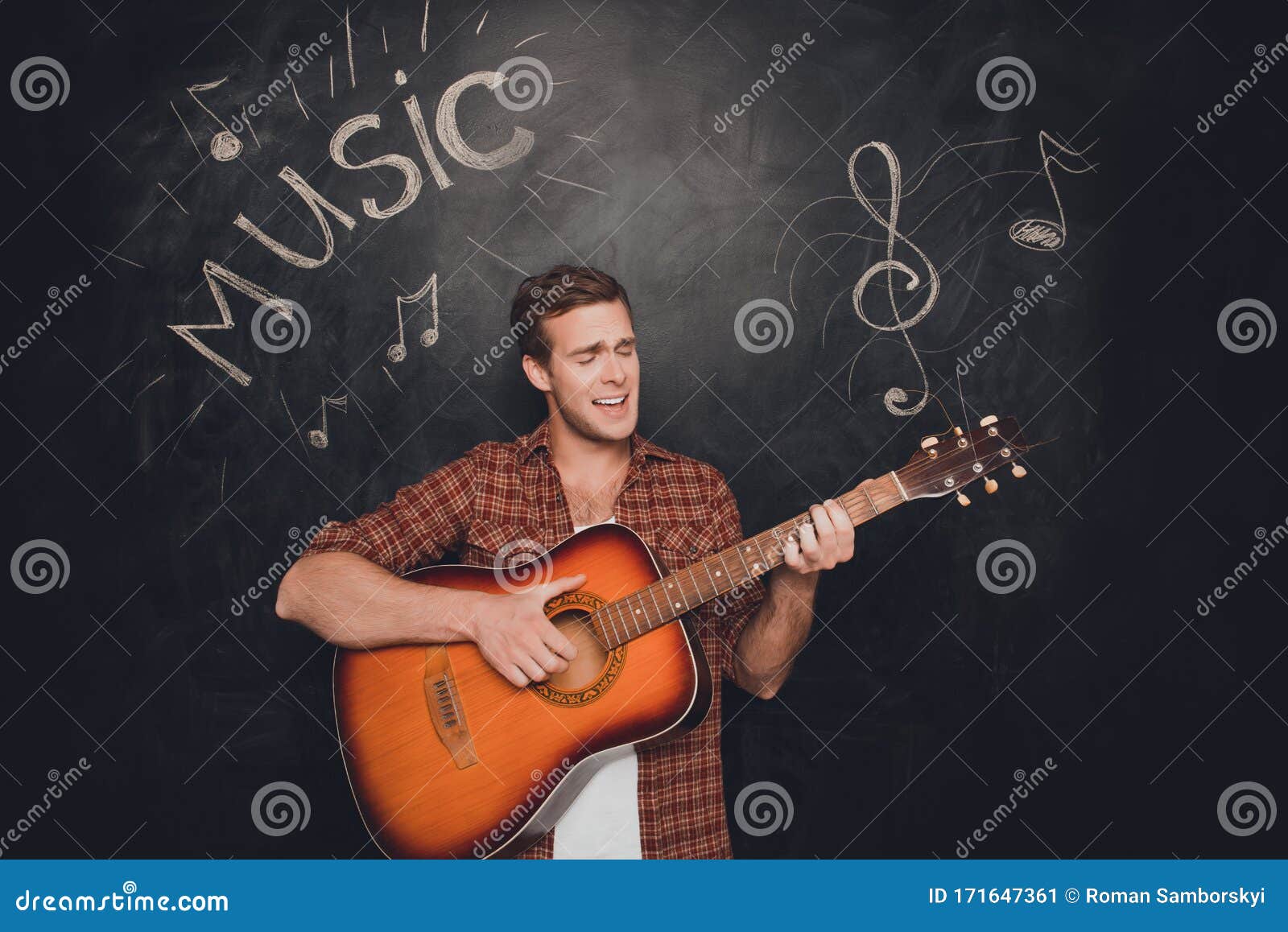 Handsome Young Instrumentalist Playing on the Guitar and Singer Stock ...