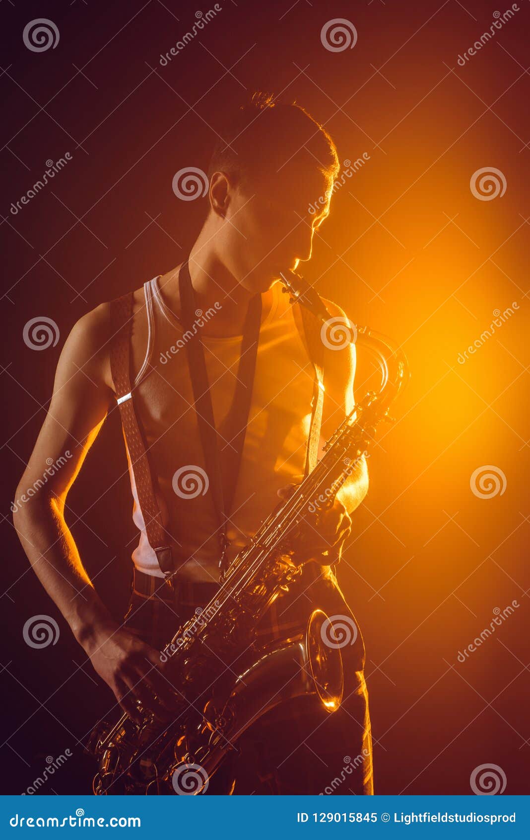 Handsome Young Jazzman Playing Saxophone Stock Image - Image of ...