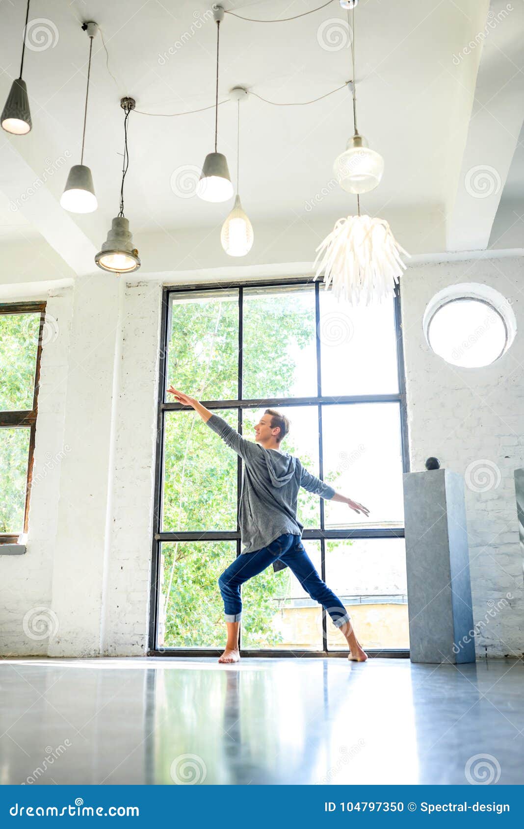 A Handsome Young Male Ballet Dancer Practicing in a Loft Style a Stock ...